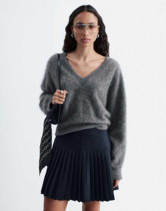 & Other Stories mini-jupe pliss&eacute;e en m&eacute;lange de laine bleu marine