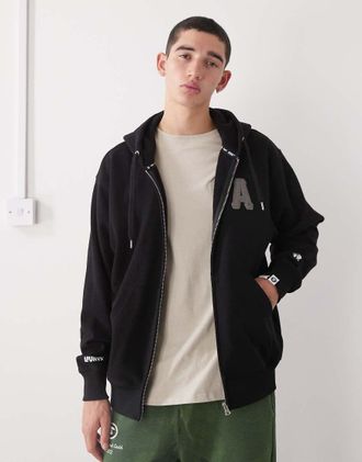 Aape By A Bathing Ape Aape by A Bathing Ape - Kapuzenjacke in Schwarz mit Rei&szlig;verschluss und A-Applikation