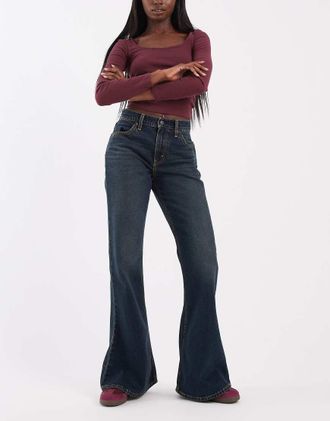 Levi's jean flare &agrave; ourlet &agrave; pression personnalisable bleu fonc&eacute;