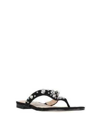 Guess CHAUSSURES - Tongs sur YOOX.COM