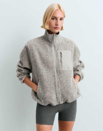 Oysho Jacke aus Kunstfell in meliertem Mittelgrau