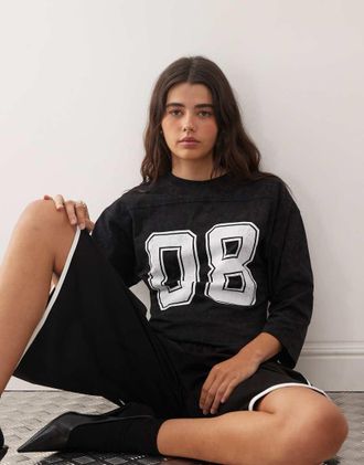 Lioness City - Oberteil aus Baumwolle in Schwarz mit Dreiviertelärmeln und 08-Sport-Print