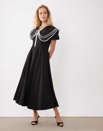Sister Jane Sister Jane - Robe mi-longue &agrave; manches bouffantes et col oversize - Noir