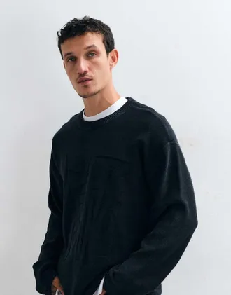 Weekday Oversize-Pullover mit Keep Going 3D-Jacquard-Grafik in Schwarz