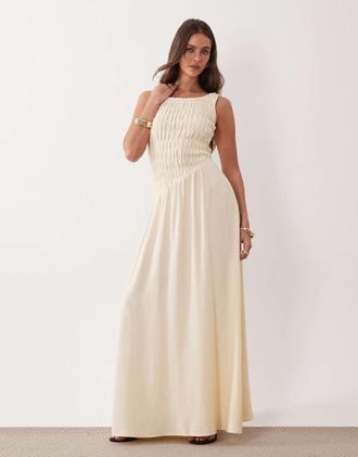 the frolic Exclusivit&eacute; - The Frolic - Robe longue et sans manches en aspect lin avec taille asym&eacute;trique et fronces - Citron-Blanc