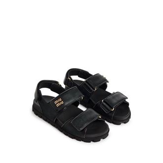 Miu Miu Sandales plates en cuir