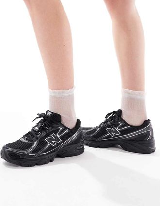 New Balance 740 - Sneaker in Schwarz und Metallic-Silber