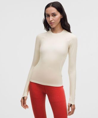 lululemon Baselayer-Pullover mit Rundhalsausschnitt aus einer f&uuml;r Frauen - Merinowollmischung - Gr&ouml;&szlig;e 2XS in Light Ivory/Black