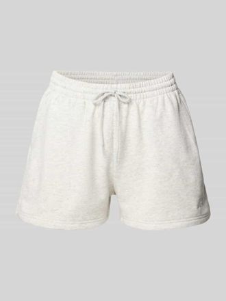 New Balance Sweatshorts mit Eingrifftaschen