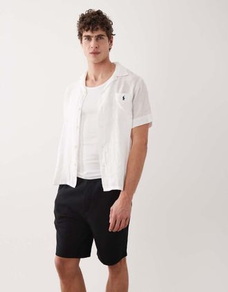 Polo Ralph Lauren Short technique en maille &agrave; logo embl&eacute;matique - Noir