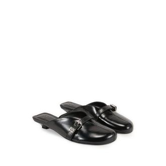 Ganni Mules avec lanière à boucle
