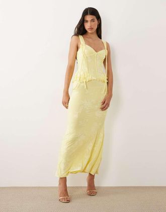Asos Robe longue en d&eacute;vor&eacute; avec taille corset&eacute;e et liens nou&eacute;s - Jaune citron
