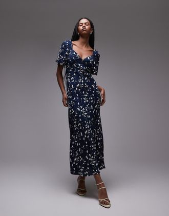 & Other Stories Robe longueur mollet à manches bouffantes et décolleté coeur torsadé - Bleu à imprimé abstrait