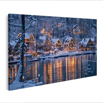 Islandburner Leinwandbild Verschneiter Winterabend am See mit beleuchteten Häusern - Leinwand 80x40cm