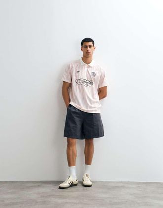 adidas Originals Jersey d&eacute;contract&eacute; d&eacute;t&eacute; avec logo manuscrit - Rose