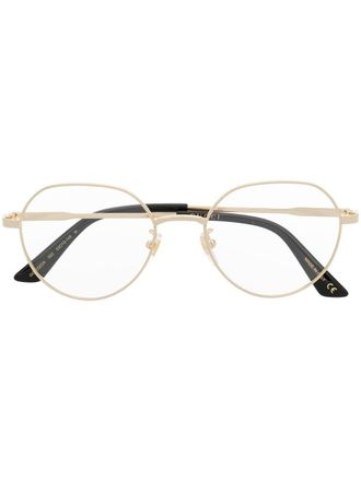 Gucci lunettes de vue rondes &agrave; logo grav&eacute; - Or
