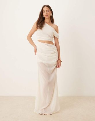 SNDYS Robe longue transparente à épaules dénudées avec découpe sur le côté - Blanc cassé