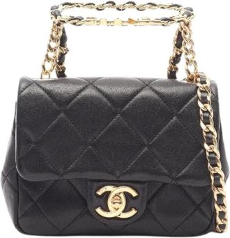 Chanel Sac bandouli&egrave;re Pre-owned Mini Matelasse &agrave; poign&eacute;e sup&eacute;rieure en cuir dagneau - Femme - Pre-owned - Noir - Taille: ONE Size