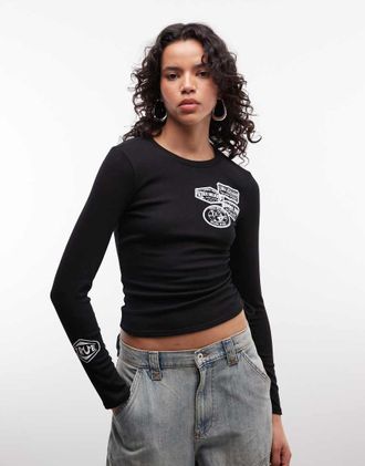 True Religion Asymmetrisches, geripptes Oberteil in Schwarz mit Denim-Applikation