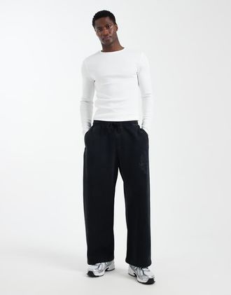 Hollister Pantalon de jogging ultra-baggy &agrave; imprim&eacute; graphique - Noir acidul&eacute;