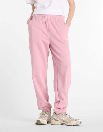 New Balance Sport Essentials - Pantalon de jogging en tissu &eacute;ponge - Rose caramel