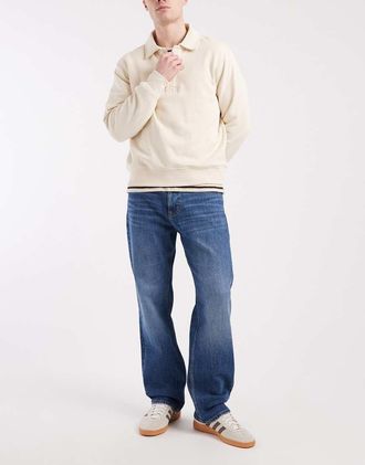 Tommy Jeans Otis - Gerade geschnittene Jeans in dunkelblauer Waschung mit regul&auml;rer Passform