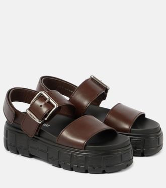 Miu Miu Plateausandalen 50 aus Leder