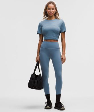 lululemon Wunder Train Leggings mit hohem Bund und Taschen f&uuml;r Frauen - 63,5 cm - Gr&ouml;&szlig;e 10 in Steel Blue