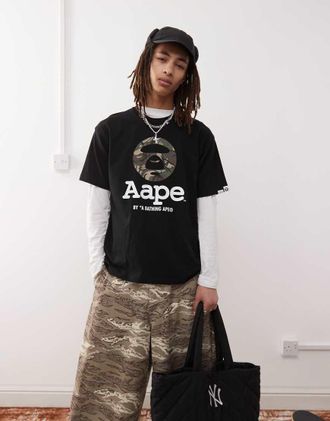 Aape By A Bathing Ape AAPE by A BATHING APE - T-shirt à logo et imprimé camouflage - Noir