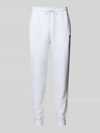Nike Sweatpants mit Label-Stitching und Ges&auml;&szlig;tasche