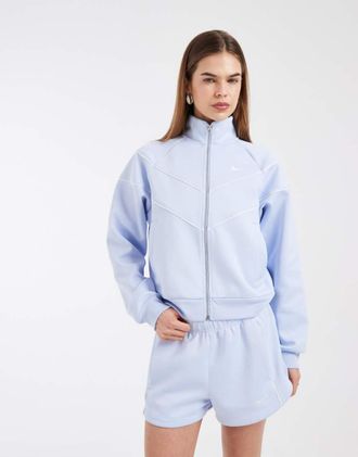 Nike Veste de surv&ecirc;tement coupe-vent - Bleu clair