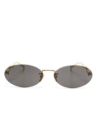 Gucci Sonnenbrille mit ovalem Gestell - Gold