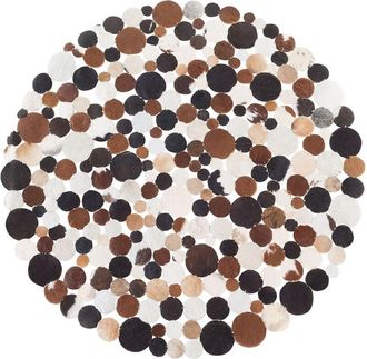 Beliani Beliani - Tapis Rond ø 140 cm de Diamètre en Peau de Vache Beige Marron Fait à la Main Sorgun