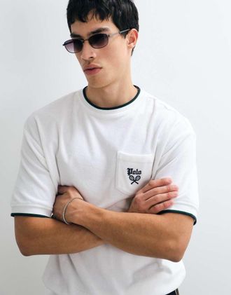 Polo Ralph Lauren top en tissu &eacute;ponge coupe d&eacute;contract&eacute;e &agrave; manches courtes en blanc