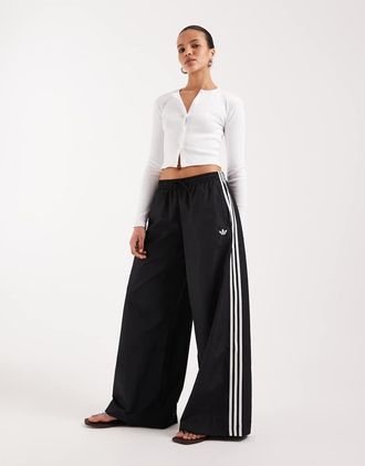 adidas Originals Firebird - Pantalon de surv&ecirc;tement classique - Noir et blanc