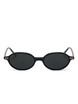 Karen Wazen lunettes de soleil Noor &agrave; monture ovale - Noir