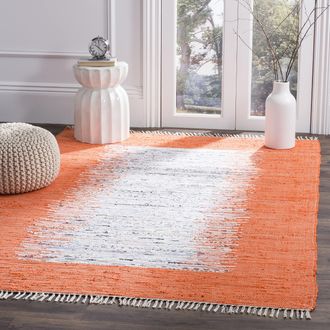 Safavieh Modern Teppich f&uuml;r Wohnzimmer, Esszimmer, Schlafzimmer - Montauk Collection, Kurzer Flor, Elfenbein und Orange, 152 X 244 cm