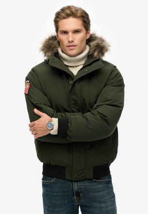 Superdry Steppjacke EVEREST FAUX FUR BOMBER JACKET mit lockerer Passform, unifarbenes Design