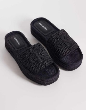 Calvin Klein Jeans - Espadrilles-Sandalen in Schwarz mit flacher Plateausohle aus Bast