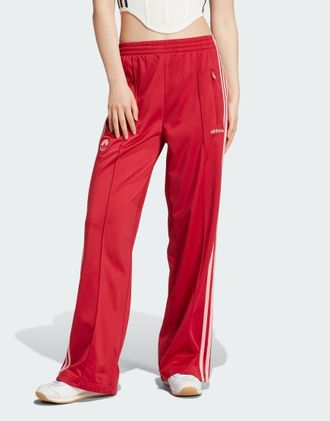 adidas Originals Firebird - Pantalon de surv&ecirc;tement avec &eacute;cusson logo - Rouge