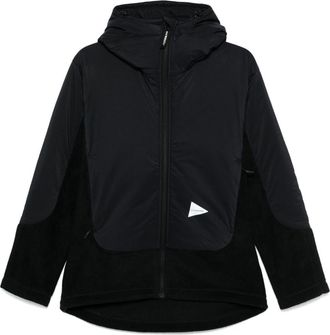 And Wander Jacke mit Kapuze - Schwarz