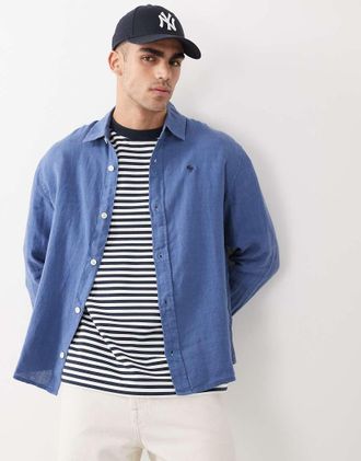 Abercrombie & Fitch Chemise 100 % lin &agrave; manches longues et logo embl&eacute;matique - Bleu