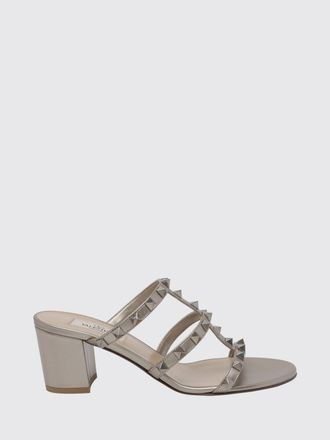 Valentino Garavani Mules &agrave; talon moyen Rockstud en cuir lamin&eacute; avec clous