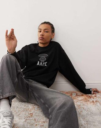 Aape By A Bathing Ape AAPE by A BATHING APE - Sweat avec logo et imprim&eacute; camouflage en d&eacute;vor&eacute; - Noir-Neutral