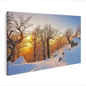 Islandburner Leinwandbild Winterlicher Sonnenaufgang im verschneiten Waldlandschaft - Leinwand 100x57cm