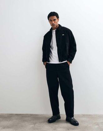 Lacoste wattierte Cord-Pilotenjacke in Schwarz