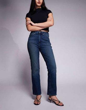 Good American Good Standard - Gerade geschnittene Jeans aus Baumwolle in dunkelblauer Waschung