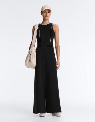 Oysho Oysho - Langer Pikee-Jumpsuit in Schwarz mit Baumwollanteil und Paspelierung