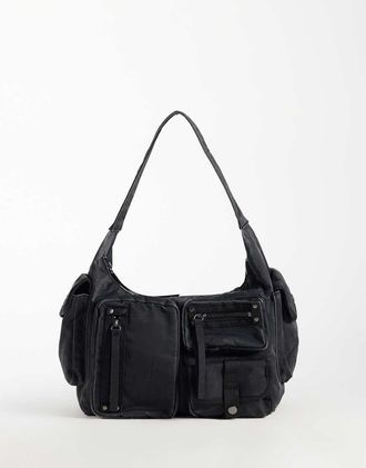 Weekday sac bandouli&egrave;re multi-poches noir d&eacute;lav&eacute;