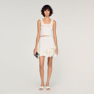 Sandro Kurzes Stricktop mit Blumenmotiv